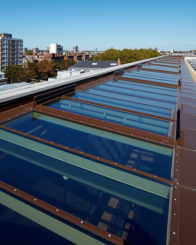 Excellent performance LAMILUX atrium glass roof installed at Cremer ...